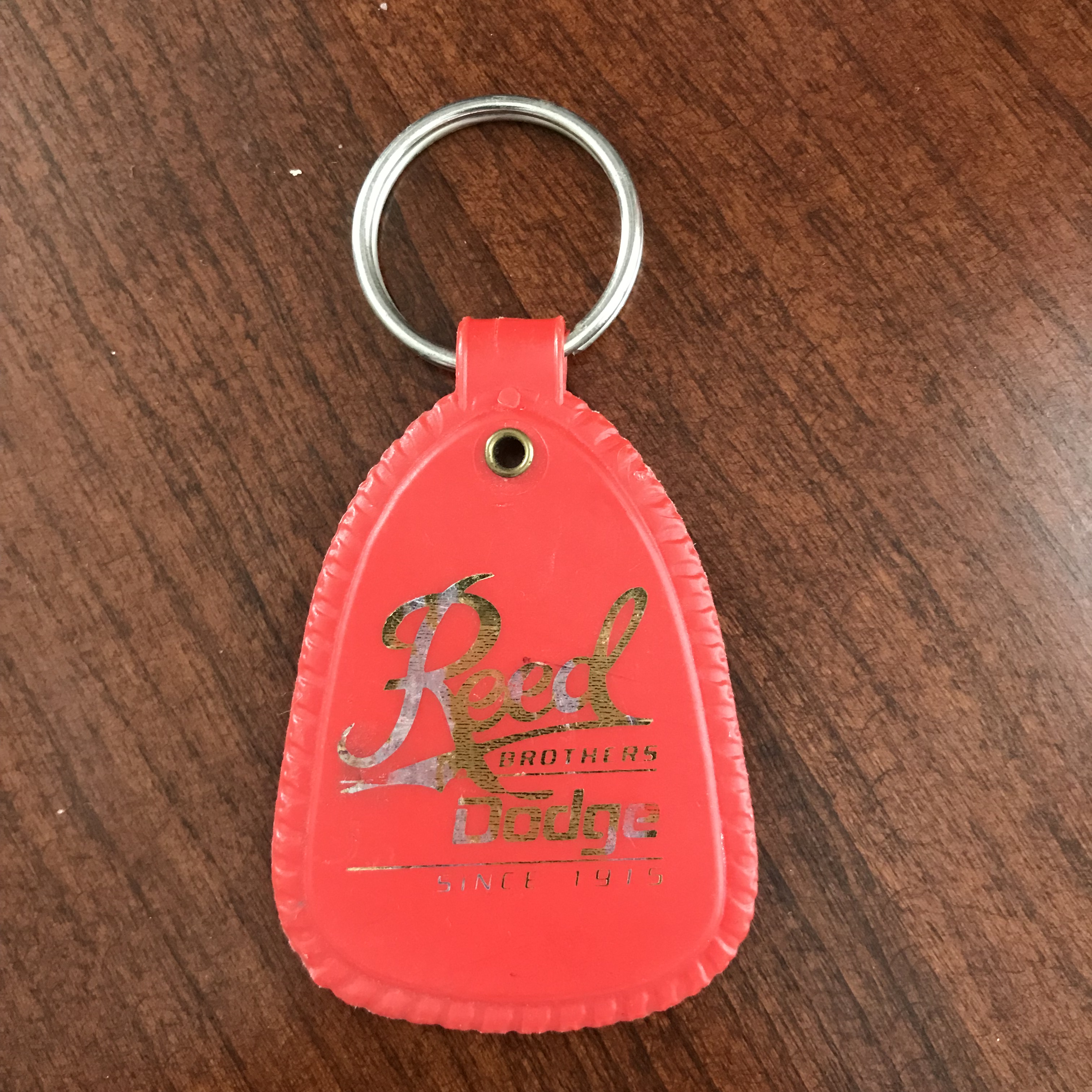 Reed Brothers Dodge Keychain | Reed Brothers Dodge History 1915 – 2012
